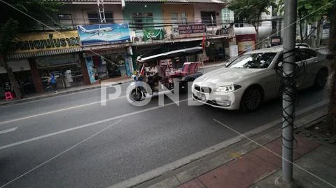 Tuk tuk also known as sam-lor (motorized rickshaw) at Chinatown Bangkok ...