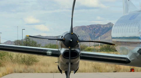 A turboProp airplane starting an engine | Stock Video | Pond5