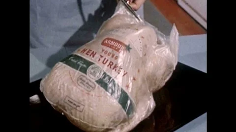 A turkey is unwrapped, cooked in an oven... | Stock Video | Pond5