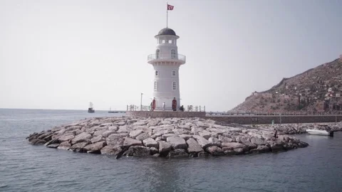 Turkish Lighthouse in the sea with mount... | Stock Video | Pond5