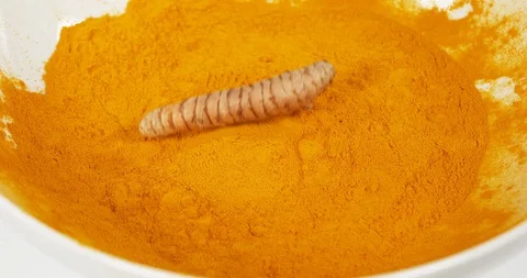 Turmeric, curcuma longa, Root falling on... | Stock Video | Pond5
