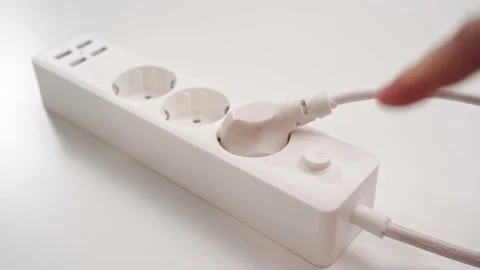 turn on plug socket. versatile modern wh... | Stock Video | Pond5