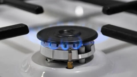 Turning on and off hob of gas stove. | Stock Video | Pond5