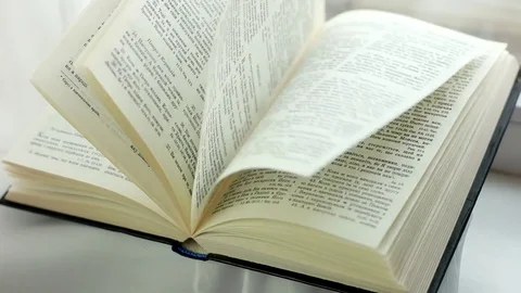 turning pages of holy bible, wind flippi... | Stock Video | Pond5