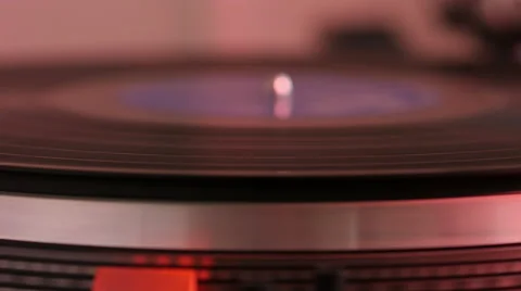 Turntable spinning vinyl, side view, red... | Stock Video | Pond5