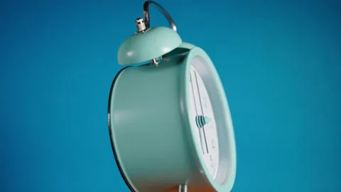 Turquoise retro alarm clock rings at 6 a... | Stock Video | Pond5