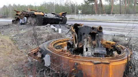 Turret of an exploded tank lying on the ... | Stock Video | Pond5