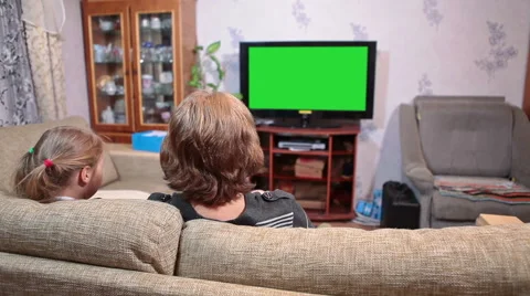 TV with green screen in front of mother ... | Stock Video | Pond5