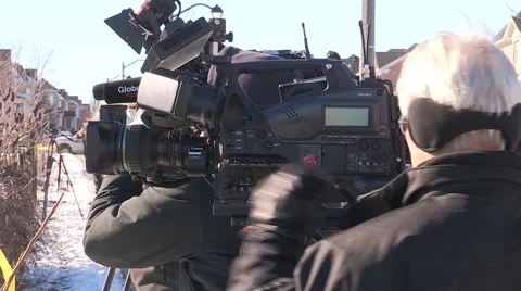 TV news cameras at crime scene gathering... | Stock Video | Pond5