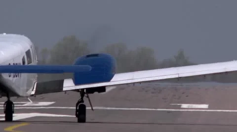A twin engined light aircraft taking off... | Stock Video | Pond5