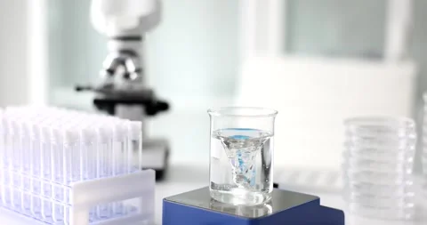 Twisting water in glass using rotating w... | Stock Video | Pond5