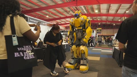 Two African women pose with Bumblebee co... | Stock Video | Pond5