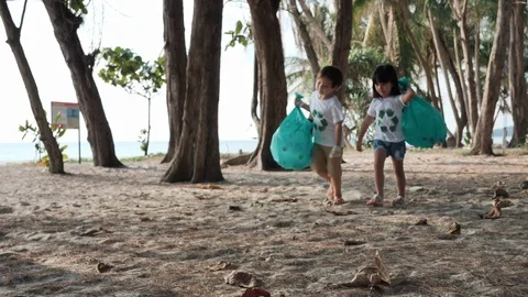 Two Asian children Help each other to co... | Stock Video | Pond5