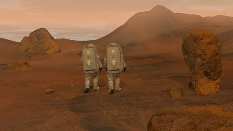 Two Astronauts Walking On The Surface Of... | Stock Video | Pond5