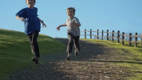 Two Brothers Running 4k Stock footage | Stock Video | Pond5