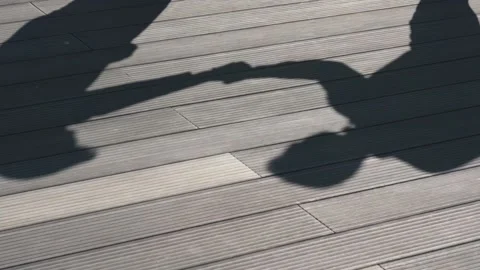 Two businessmen met, they shake hands, h... | Stock Video | Pond5