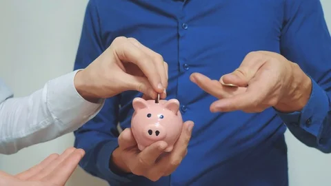 two businessmen teamwork makes savings p... | Stock Video | Pond5