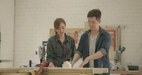 Two carpenter teamwork building design w... | Stock Video | Pond5