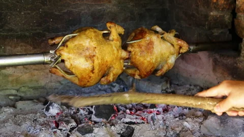 Two chicken on a spit, grilled, Meat Gri... | Stock Video | Pond5