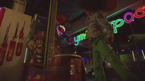 Two Children playing whack and win in th... | Stock Video | Pond5