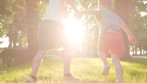 Two Children Running with Each Other int... | Stock Video | Pond5