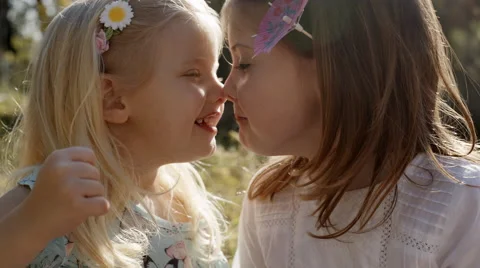 Two children touching noses | Stock Video | Pond5