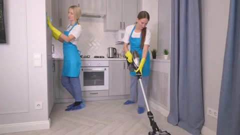 Two cleaning girls from cleaning company... | Stock Video | Pond5