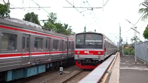 Two commuter trains crossed at a small s... | Stock Video | Pond5