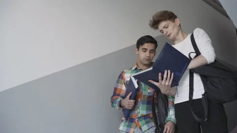Two confident smart high school students... | Stock Video | Pond5