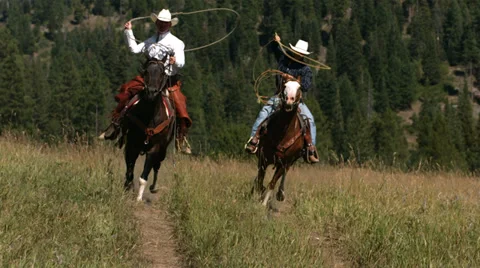 Cowboys Riding High Stock Video Footage | Royalty Free Cowboys Riding ...