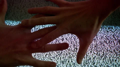 Two Crawling Hands Slide by the Screen o... | Stock Video | Pond5