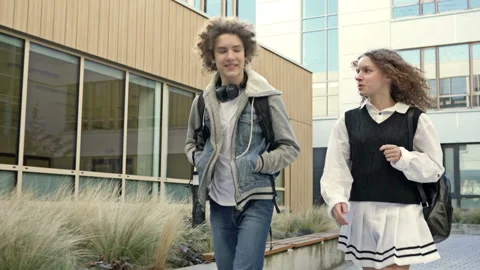 Two cute high school students, a guy and... | Stock Video | Pond5