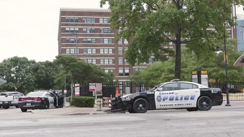 Two Dallas Police cars parked on the sid... | Stock Video | Pond5