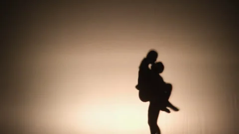 Two dancing shadows on the background of... | Stock Video | Pond5