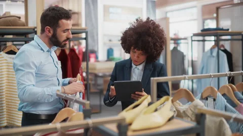 Two Department Store Workers at Work | Stock Video | Pond5