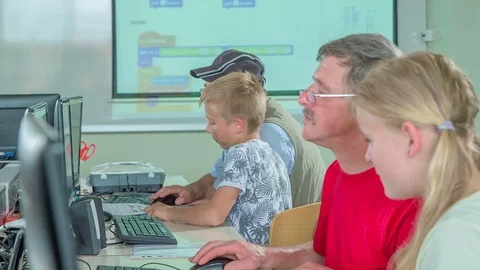 Two different generations are learning s... | Stock Video | Pond5