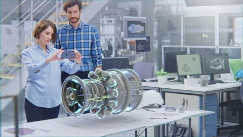 Two EngineersUse Augmented Reality to bu... | Stock Video | Pond5