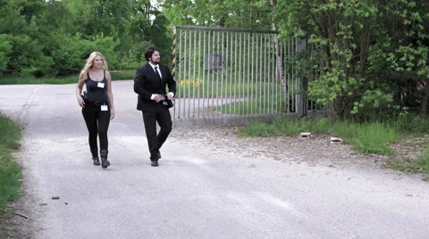 Two FBI Agents drawing guns and walking ... | Stock Video | Pond5