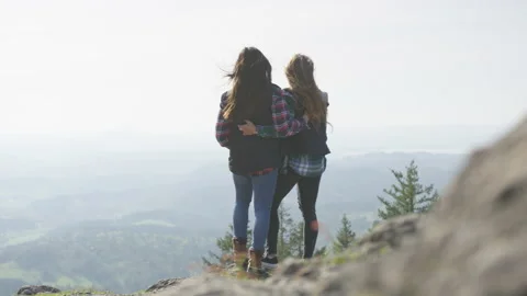 Two Female Friends Stand at the Top of a... | Stock Video | Pond5