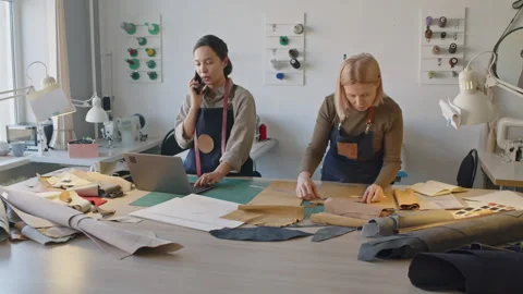 Two Female Tailors Working on Custom Ord... | Stock Video | Pond5