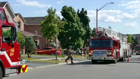 Two fire engines parked at scene of fire... | Stock Video | Pond5