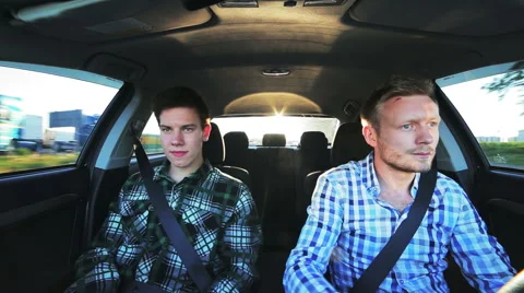 Two friends driving in the car, smiling,... | Stock Video | Pond5