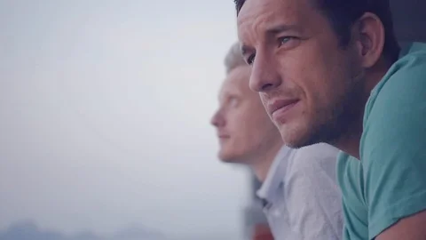 Two friends of men sail by ferry to meet... | Stock Video | Pond5