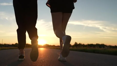 two friends running sunset, team group g... | Stock Video | Pond5