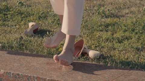 Two girls barefoot. Photo session on the... | Stock Video | Pond5