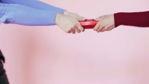 Two Girls fighting over gift. Pull each ... | Stock Video | Pond5