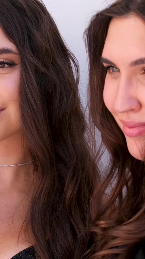 Two girls posing photo shoot. Photo sess... | Stock Video | Pond5