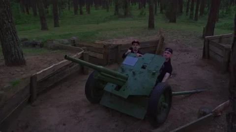 Two Guys Are Sitting Behind a Military C... | Stock Video | Pond5