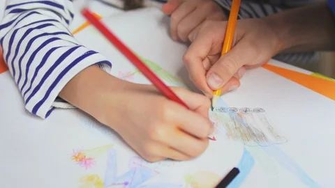 Two hands of children drawing picture us... | Stock Video | Pond5