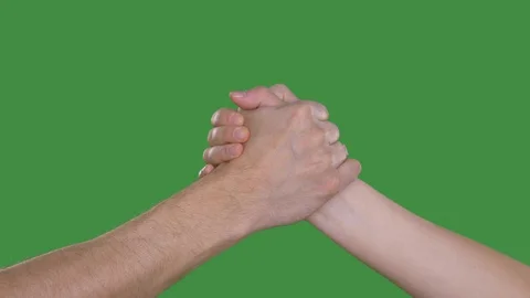 Two hands joining together on green scre... | Stock Video | Pond5